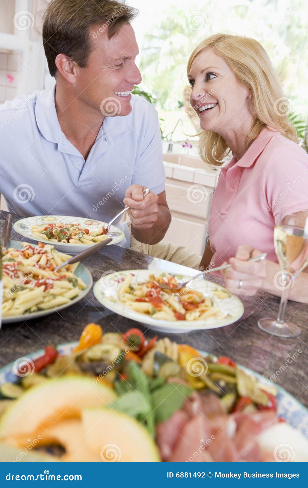 Couple Enjoying Meal, Mealtime Together Stock Photo - Image of colour ...