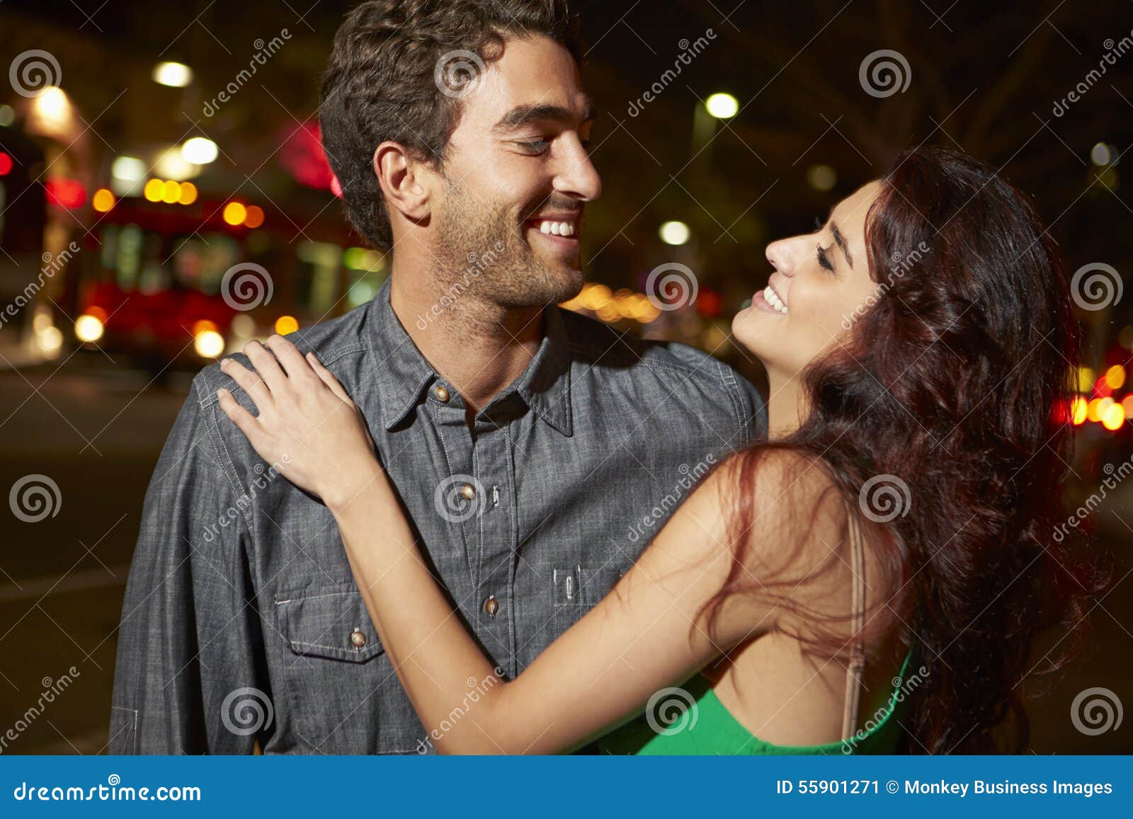 Couple Enjoying Night Out Together Stock Image - Image of mixed ...