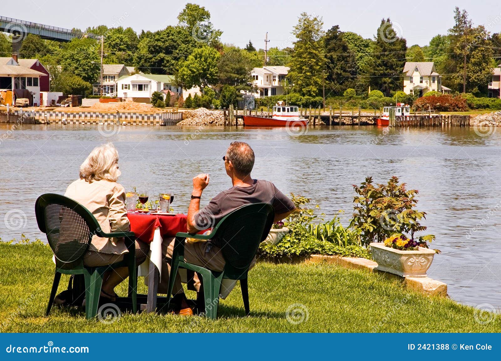 Couple enjoying river view stock photo. Image of enjoying - 2421388