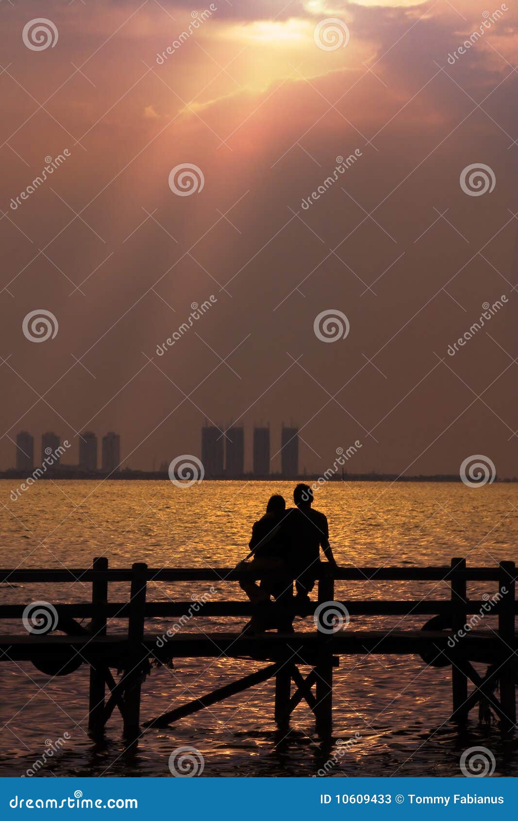 Couple Enjoying Romantic Sunset Stock Image - Image of sunset ...