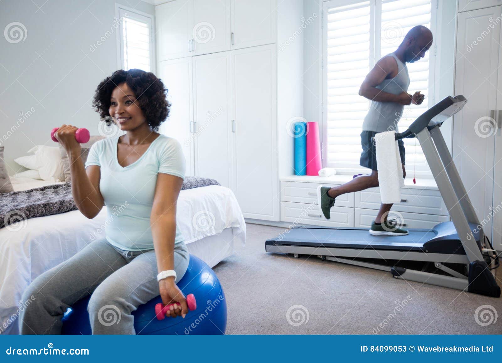 Couple Exercising in Bedroom Stock Image - Image of exercise, life ...