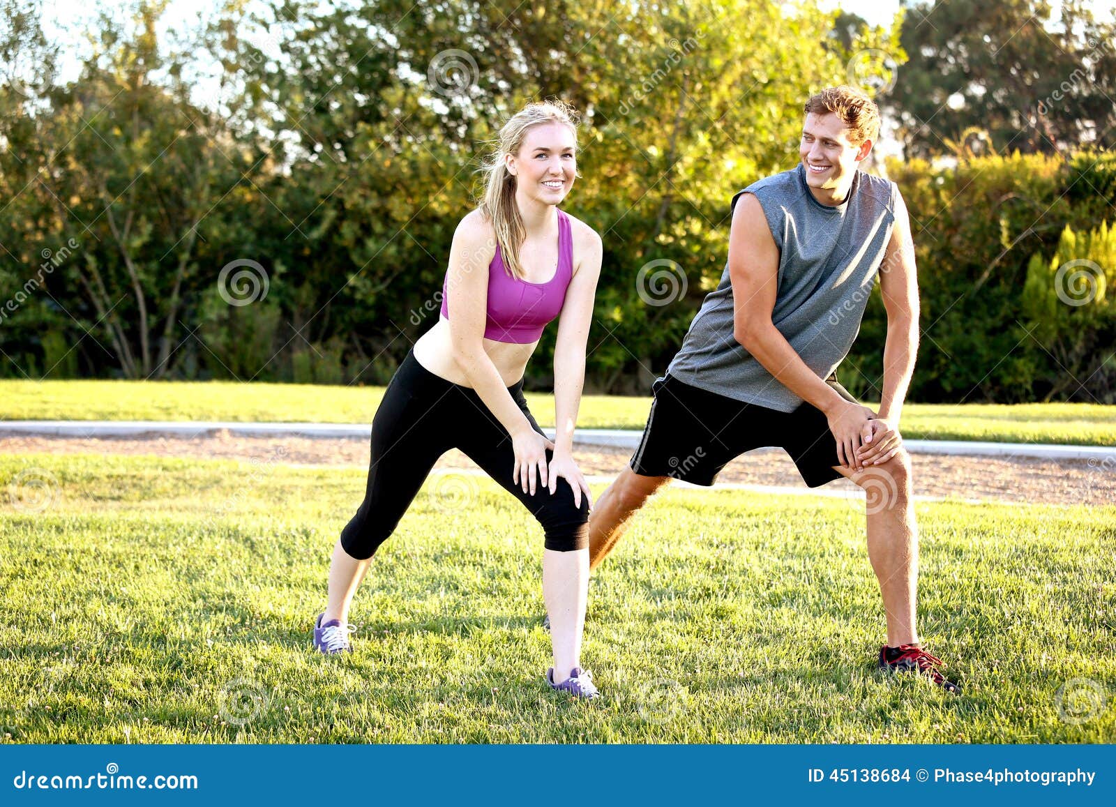 Couple exercising stock photo. Image of jump, nature - 45138684