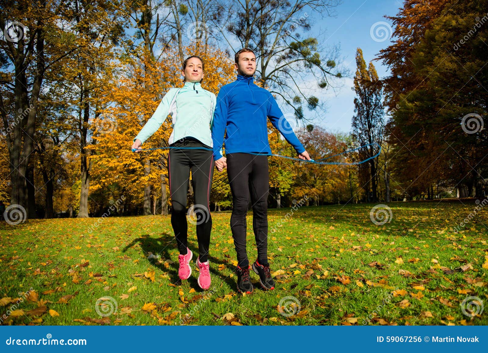 Couple Exercising with Skipping Rope Stock Photo - Image of effort ...