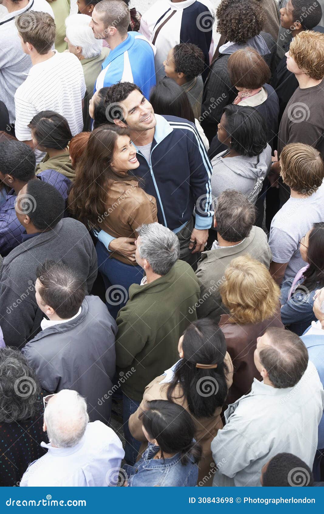 Couple Facing the Other Direction from the Multiethnic Crowd Stock ...