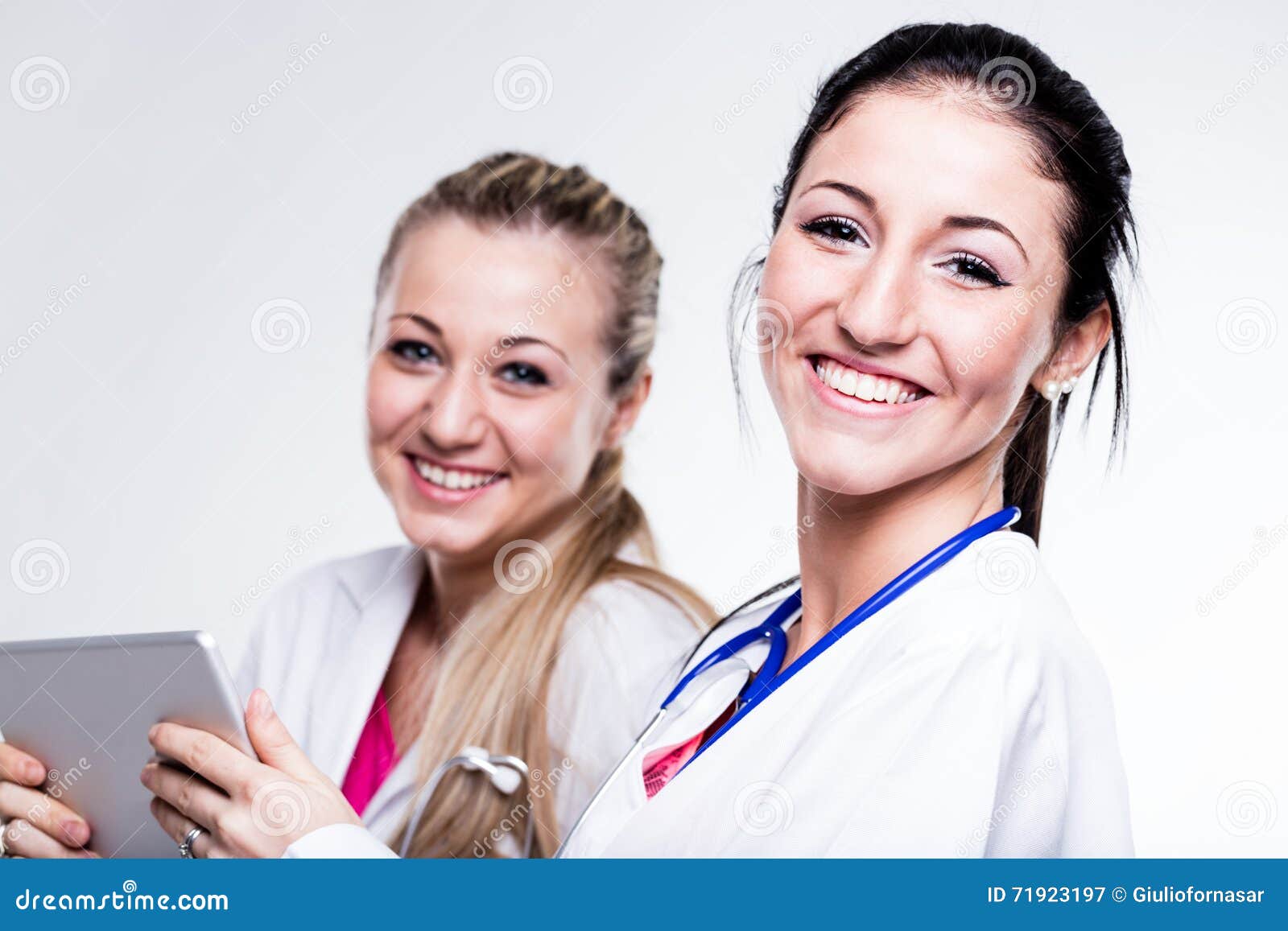 Couple of Female Doctors with Tablet Stock Image - Image of welcoming ...