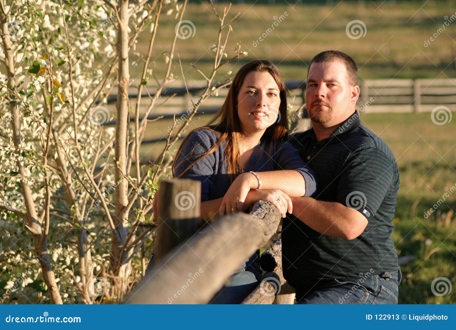 Couple on the Fence stock image. Image of family, date - 122913