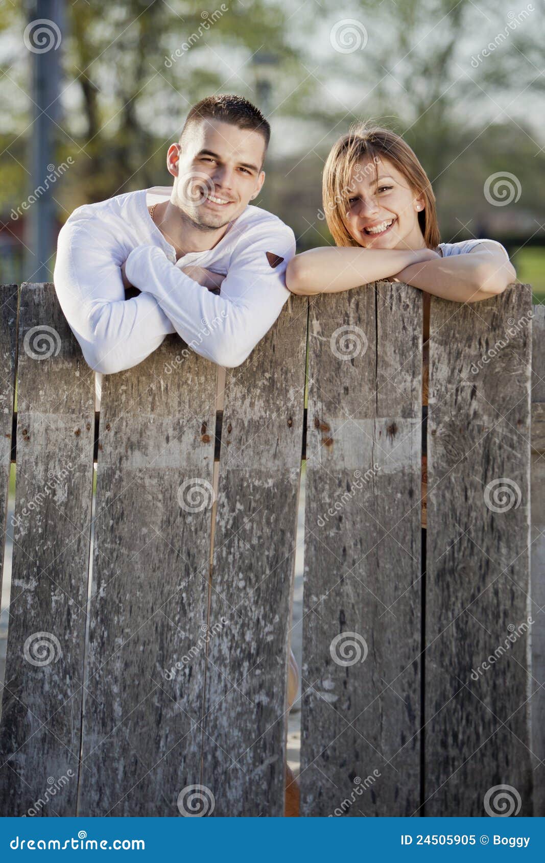 Couple by the fence stock image. Image of fence, wood - 24505905