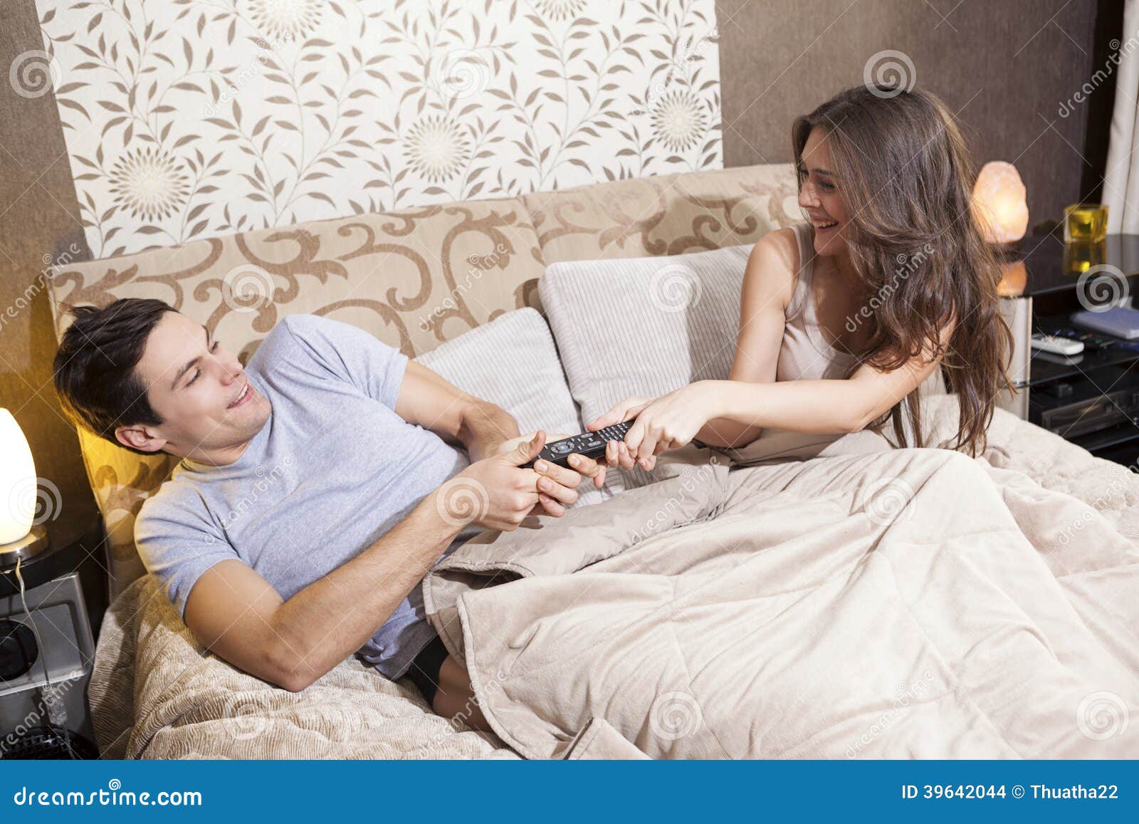Couple Fighting Over the Tv Remote Control Stock Photo - Image of ...
