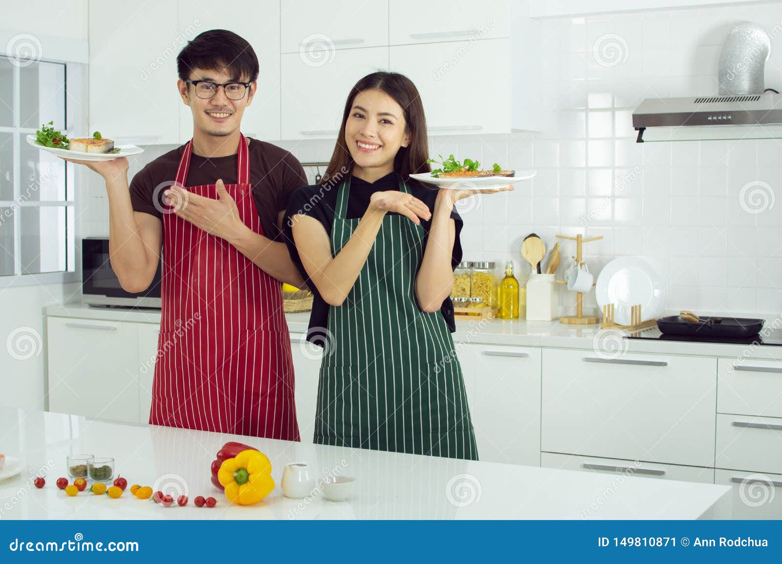 A Couple Finish Cooking and they Have Large Smiles Stock Image - Image ...