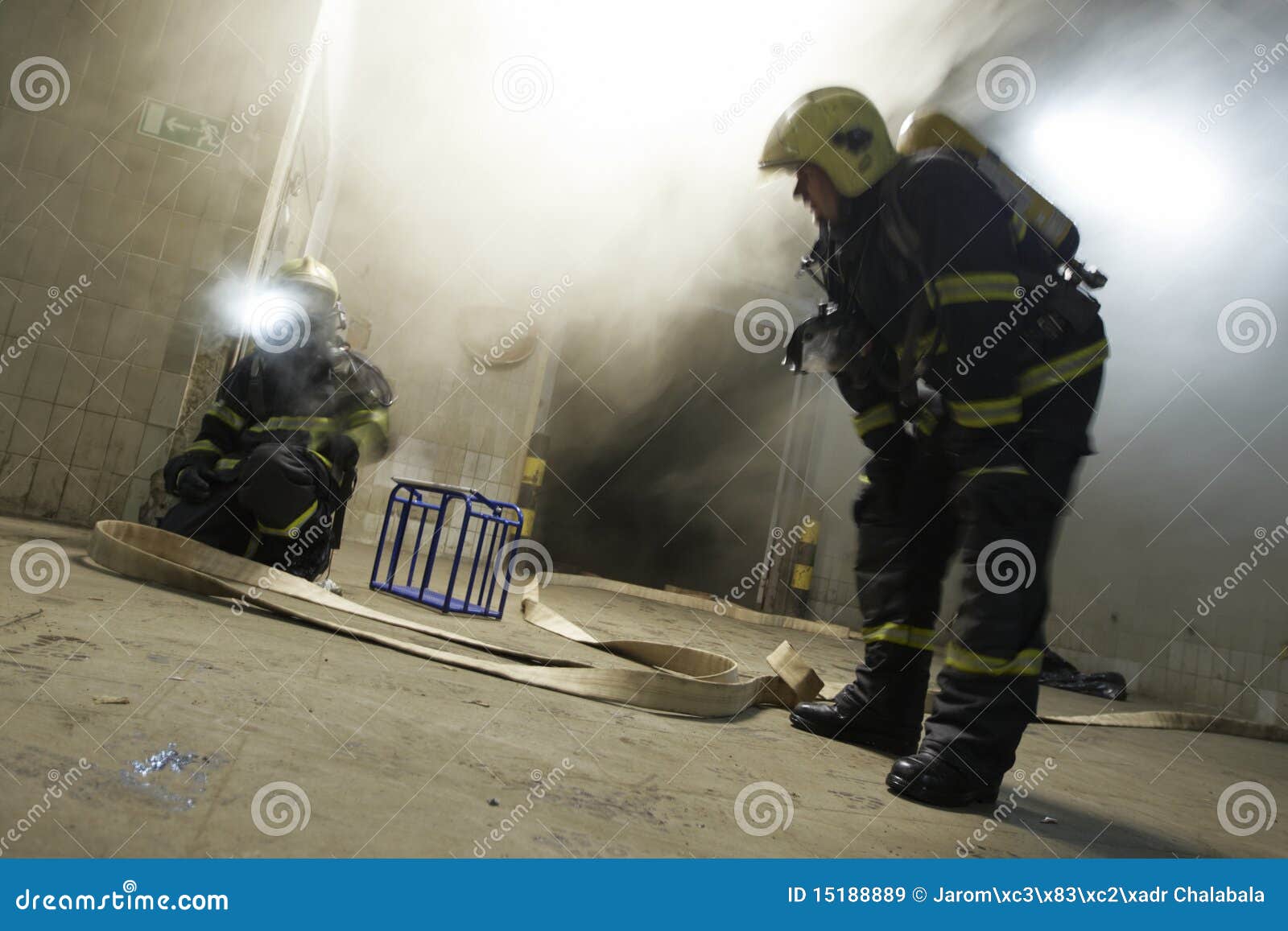 The Couple of Firemen Fighting with the Fire Editorial Stock Image ...