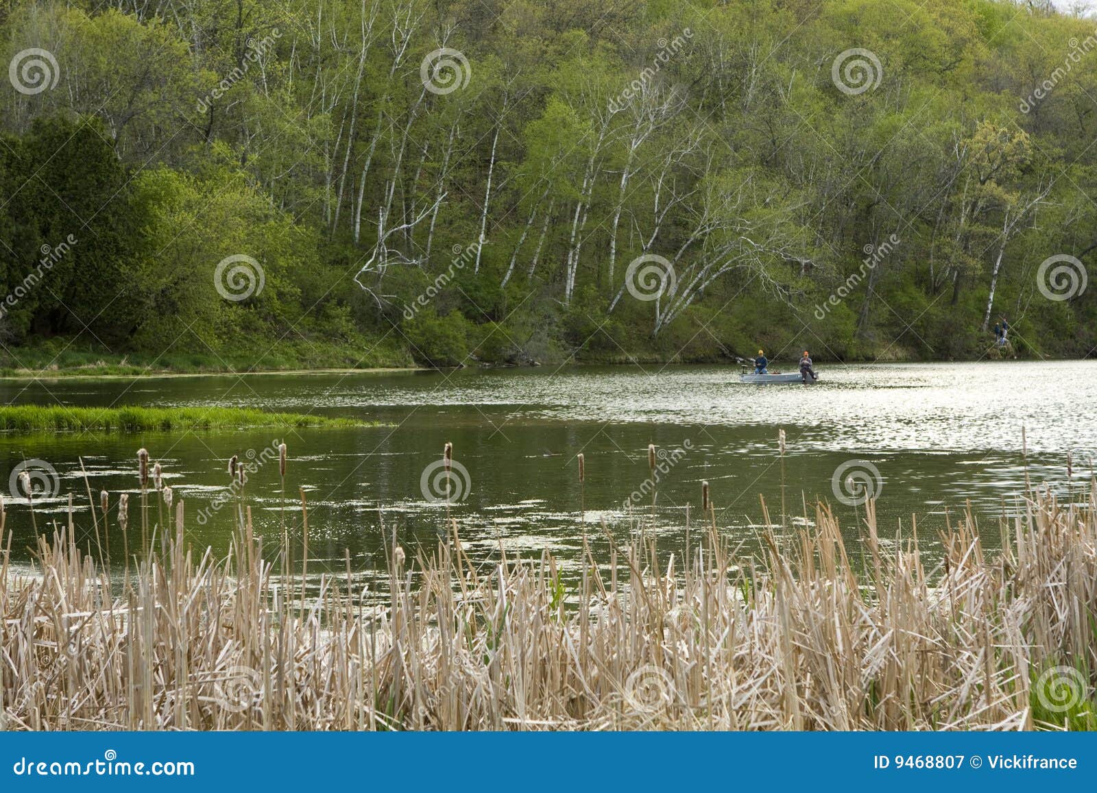 Couple Fishing in a Peaceful Spring Lake Stock Image - Image of lure ...