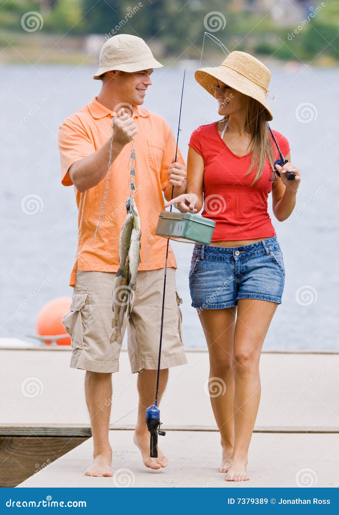 Couple fishing on pier stock image. Image of person, caucasian - 7379389