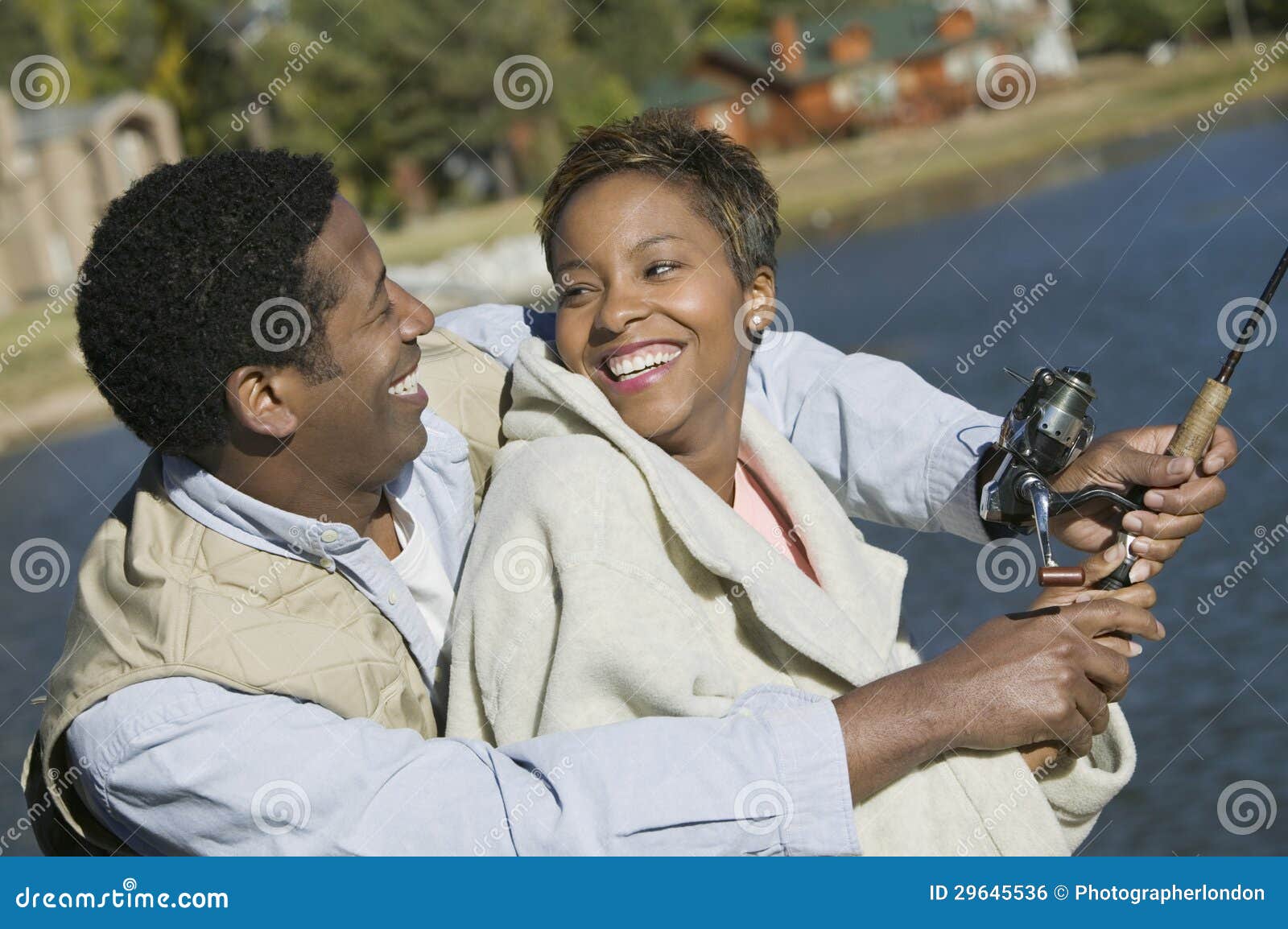 Couple Fishing Together stock photo. Image of happiness - 29645536