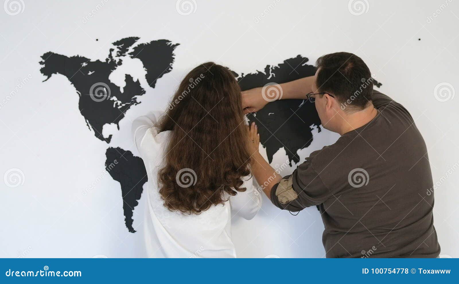 Couple is Fixing the World Map Stock Footage - Video of group, idea ...