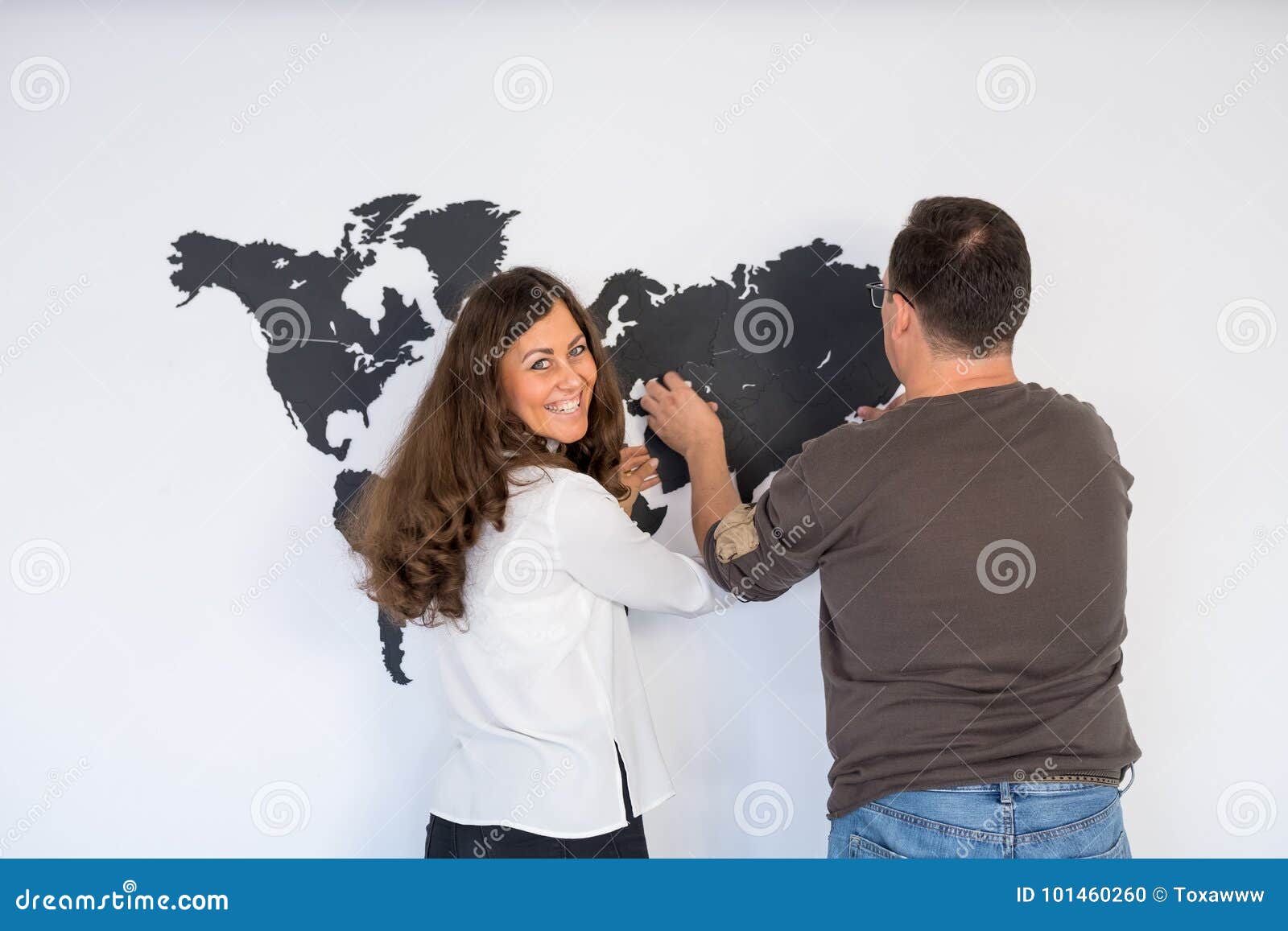 Couple is Fixing the World Map Stock Photo - Image of international ...