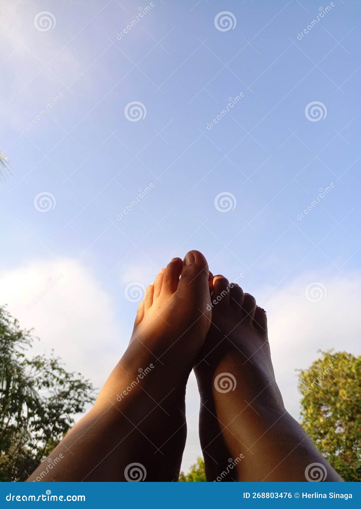 A Couple of Foot Enjoy the Blue Sky View in the Evening Stock Photo ...