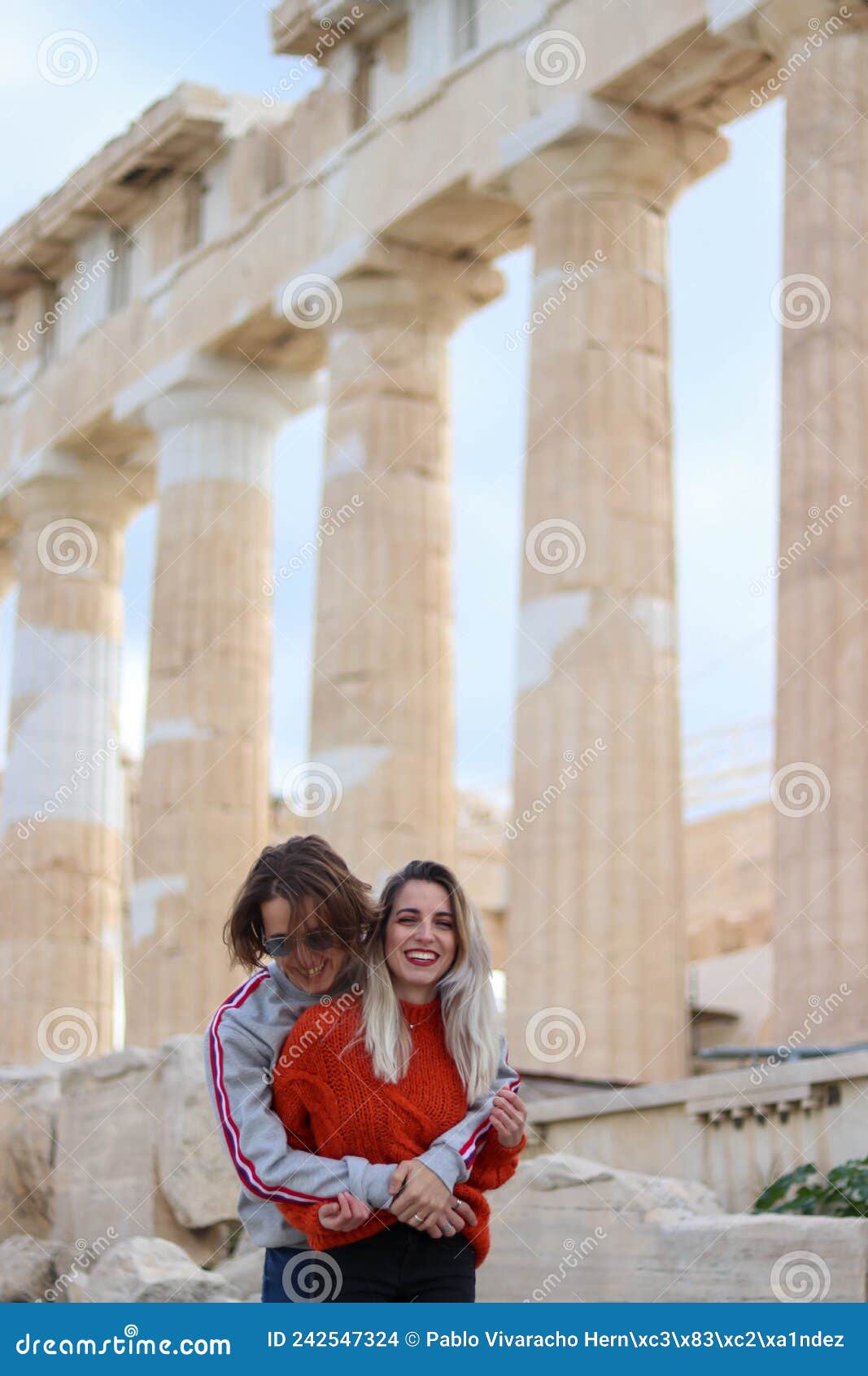 Couple of Friends Hugging Each Other at the Acropolis Stock Photo ...