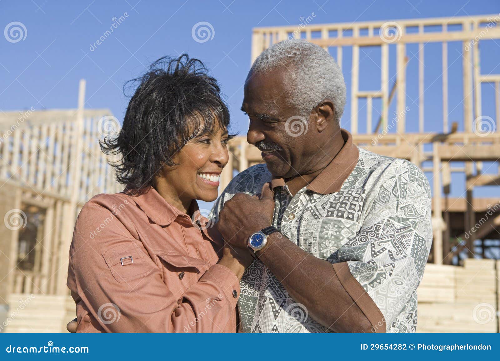 Couple in Front of Incomplete House Stock Photo - Image of happy ...