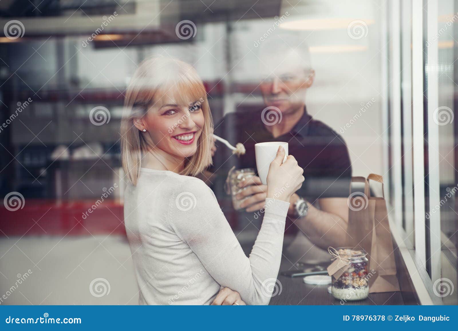 Couple at Gas Station Cafe stock photo. Image of coffee - 78976378