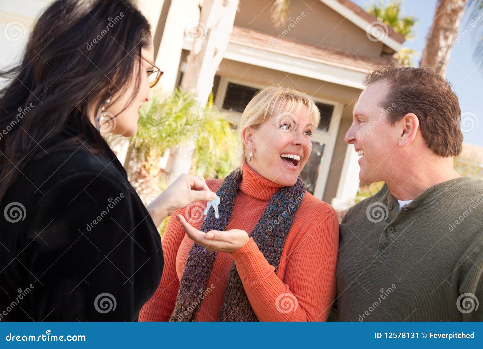 Couple Get House Keys from Hispanic Agent Stock Image - Image of ...