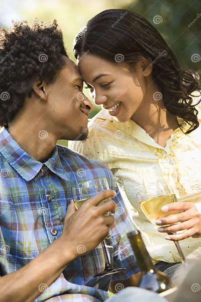 Couple getting close. stock photo. Image of picnic, celebrating - 3614286