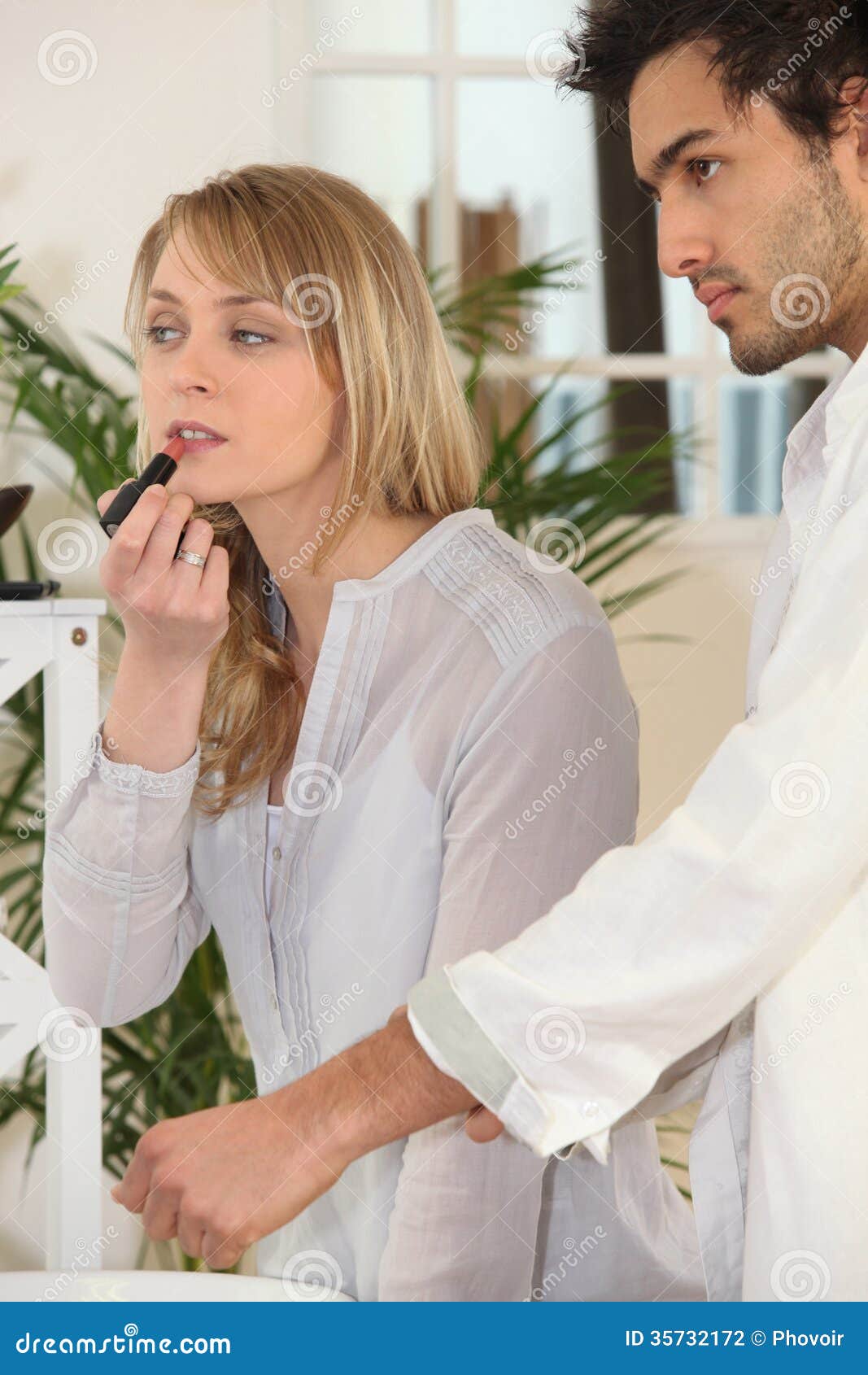 Couple getting ready stock photo. Image of apartment - 35732172