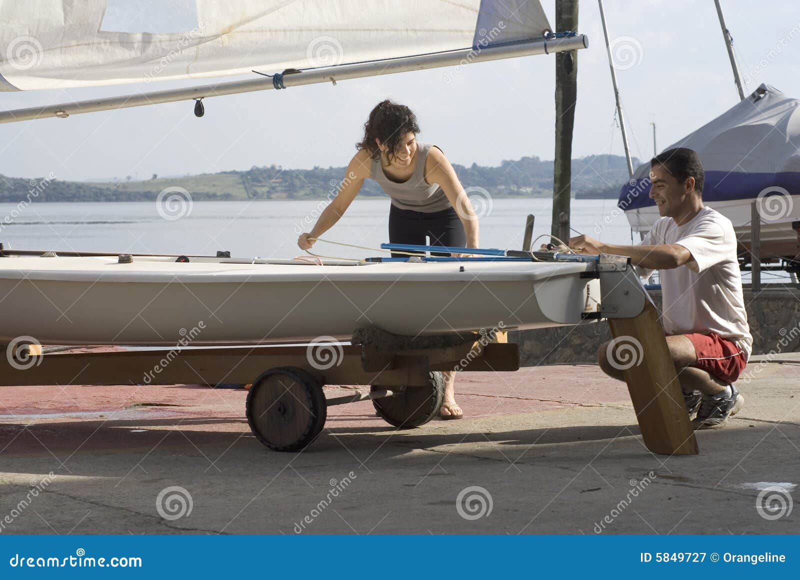 Couple Getting Ready To Sail - Horizontal Stock Image - Image of helm ...