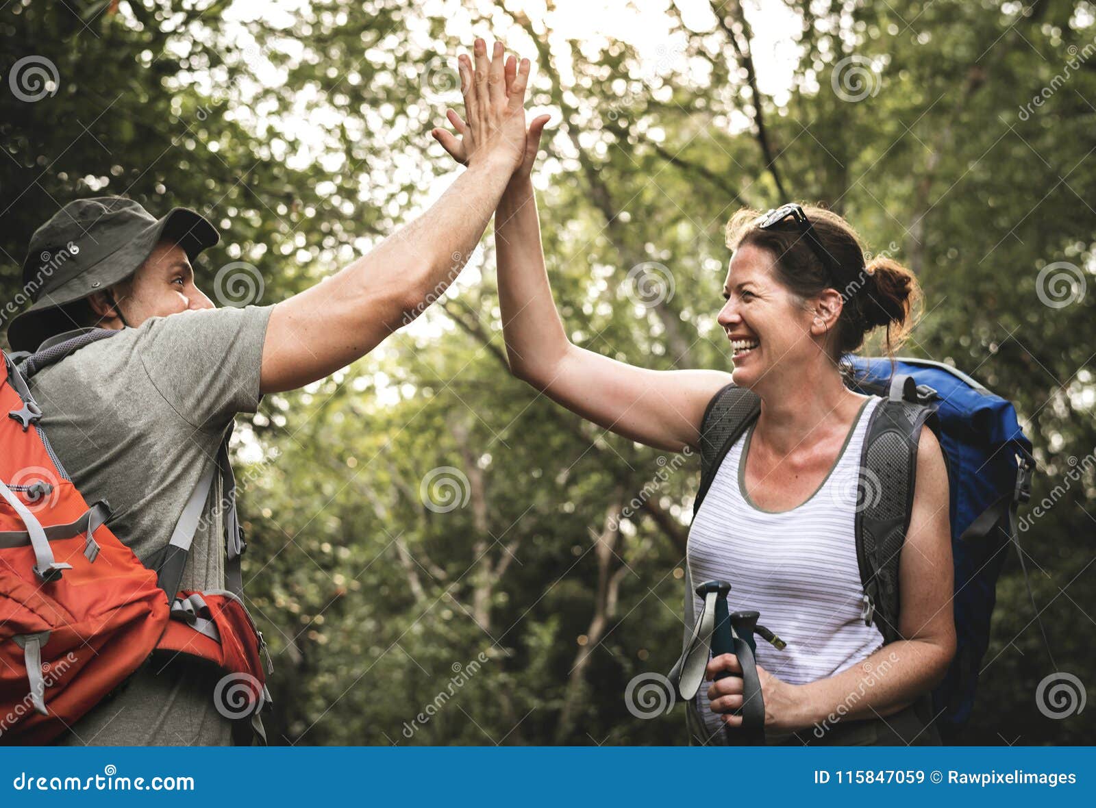 Couple giving a high five stock image. Image of partners - 115847059