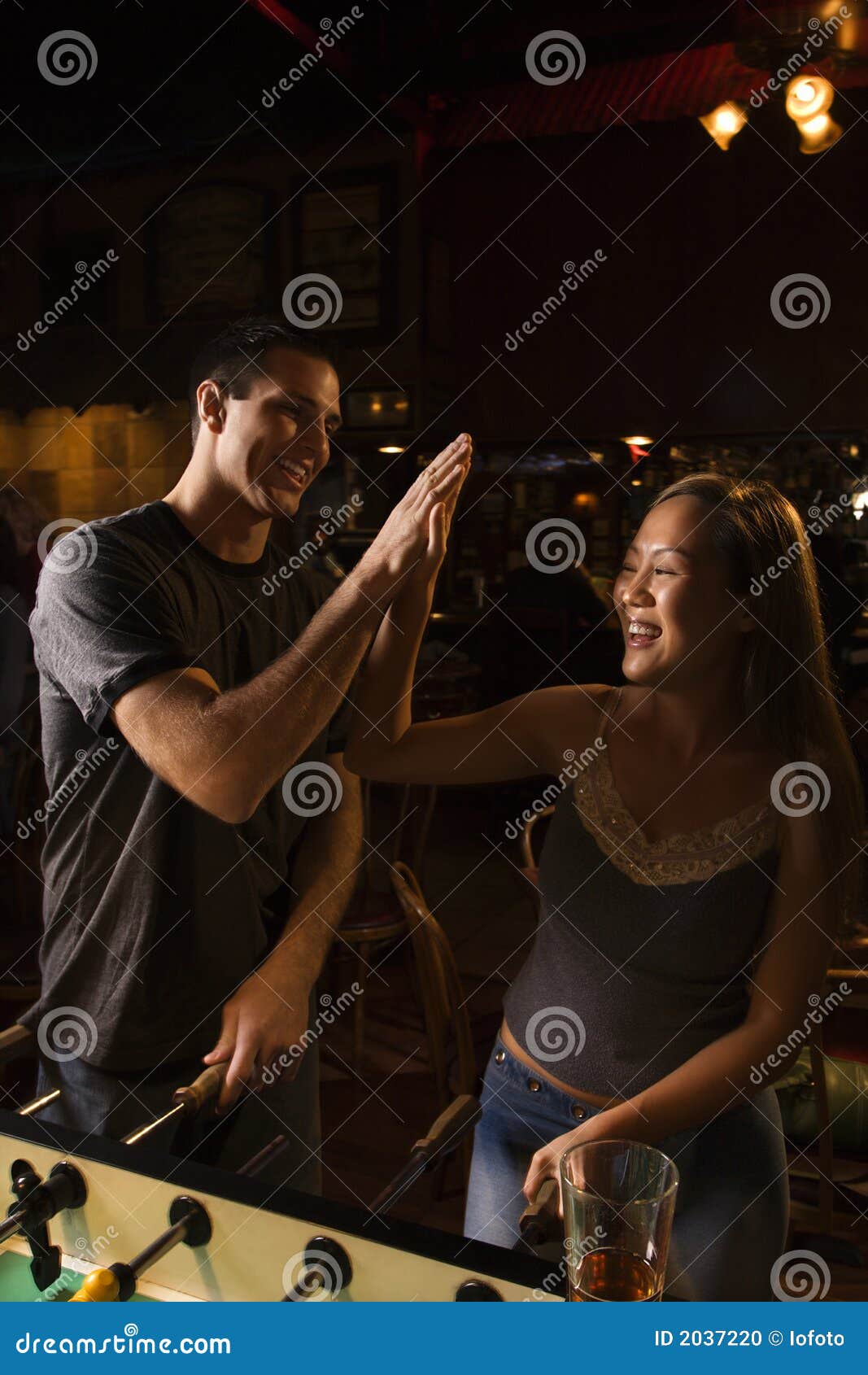 Couple giving high five. stock photo. Image of teamwork - 2037220