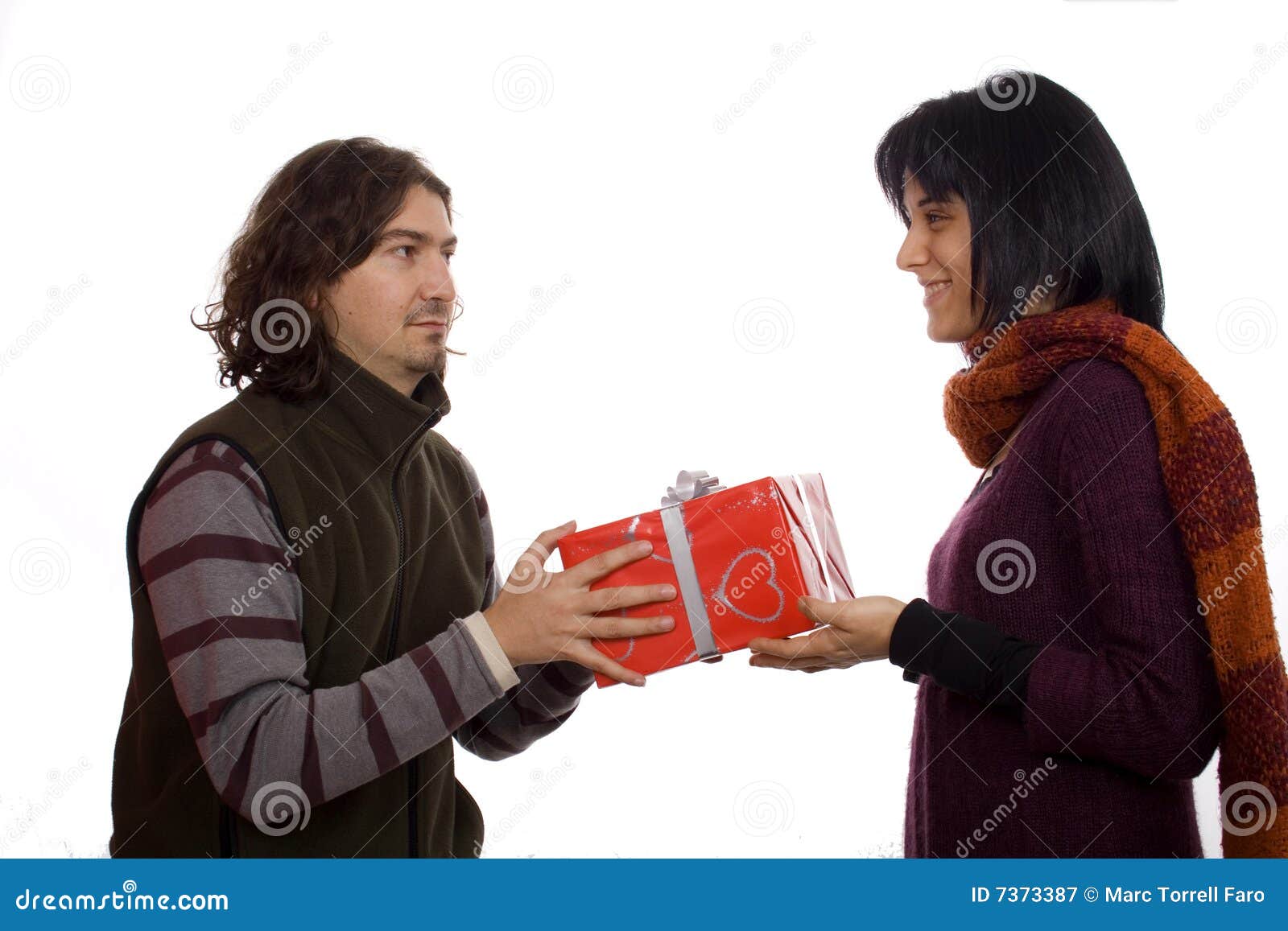 Couple giving a present stock image. Image of marriage - 7373387