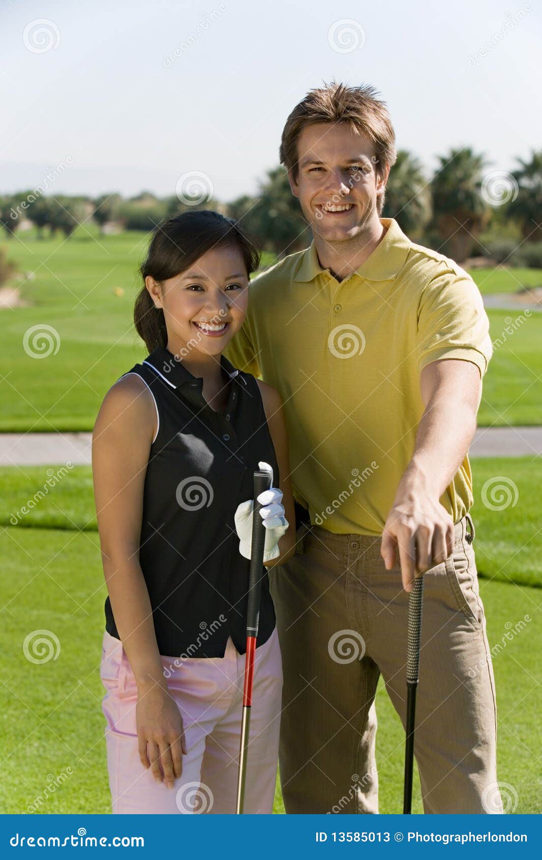 Couple of Golfers on Golf Course Stock Image - Image of posing ...