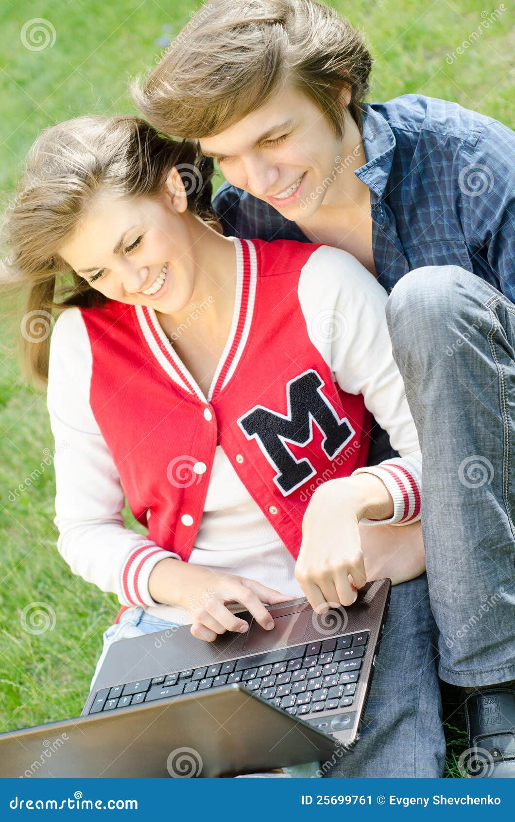 Couple in the Grass with Computer Stock Image - Image of blue, love ...