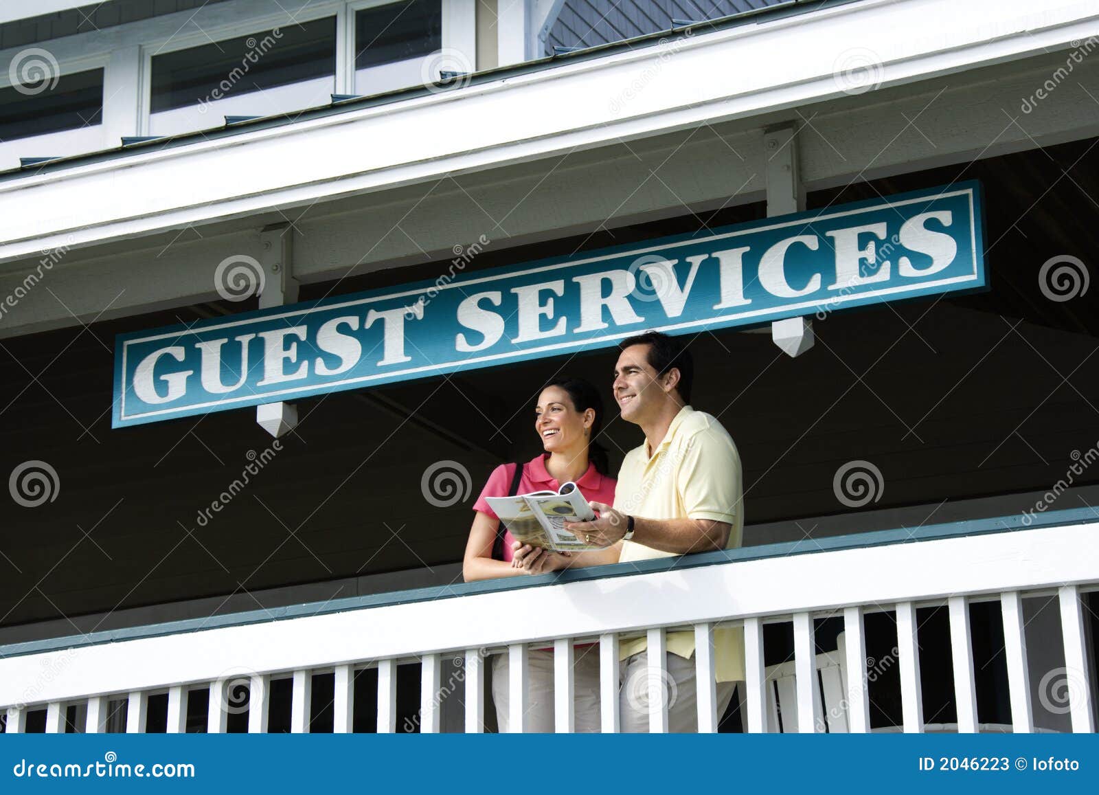 Couple at guest services. stock image. Image of color - 2046223