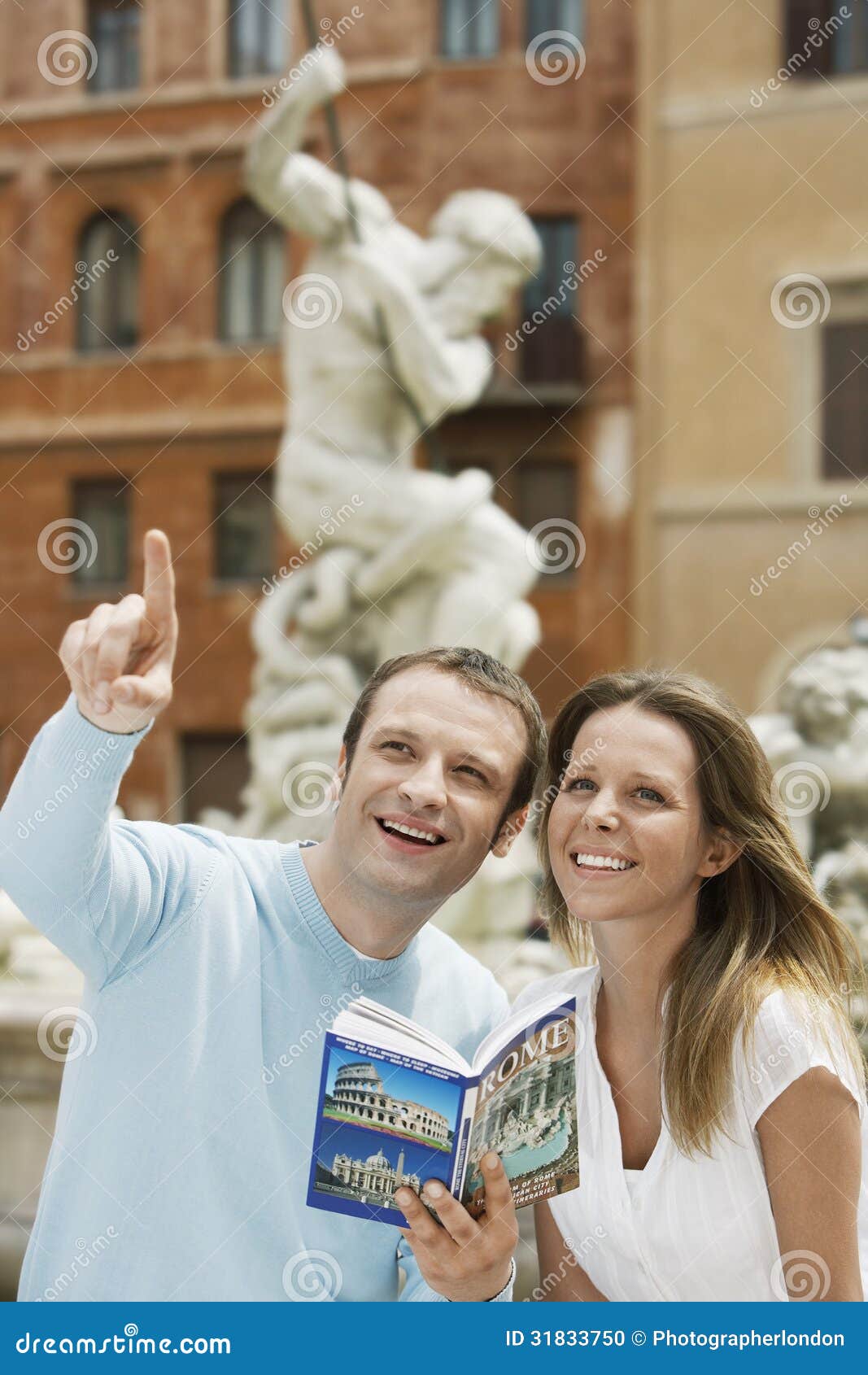 Couple with Guidebook Looking at Monuments Stock Photo - Image of ...