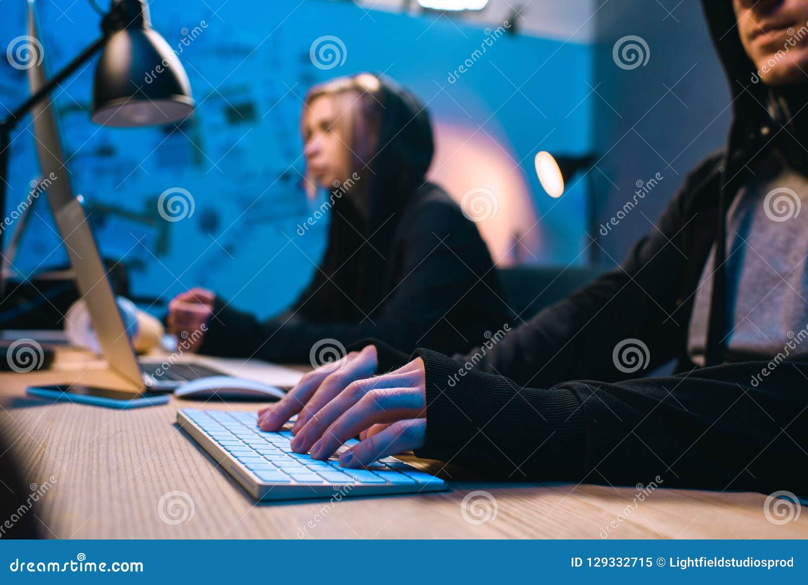 Couple of hackers stock image. Image of indoor, computers - 129332715