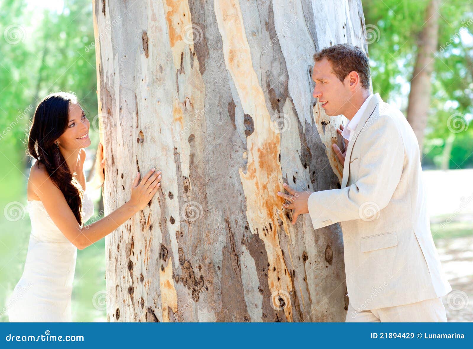 Couple Happy in Love Playing in a Tree Trunk Stock Image - Image of ...