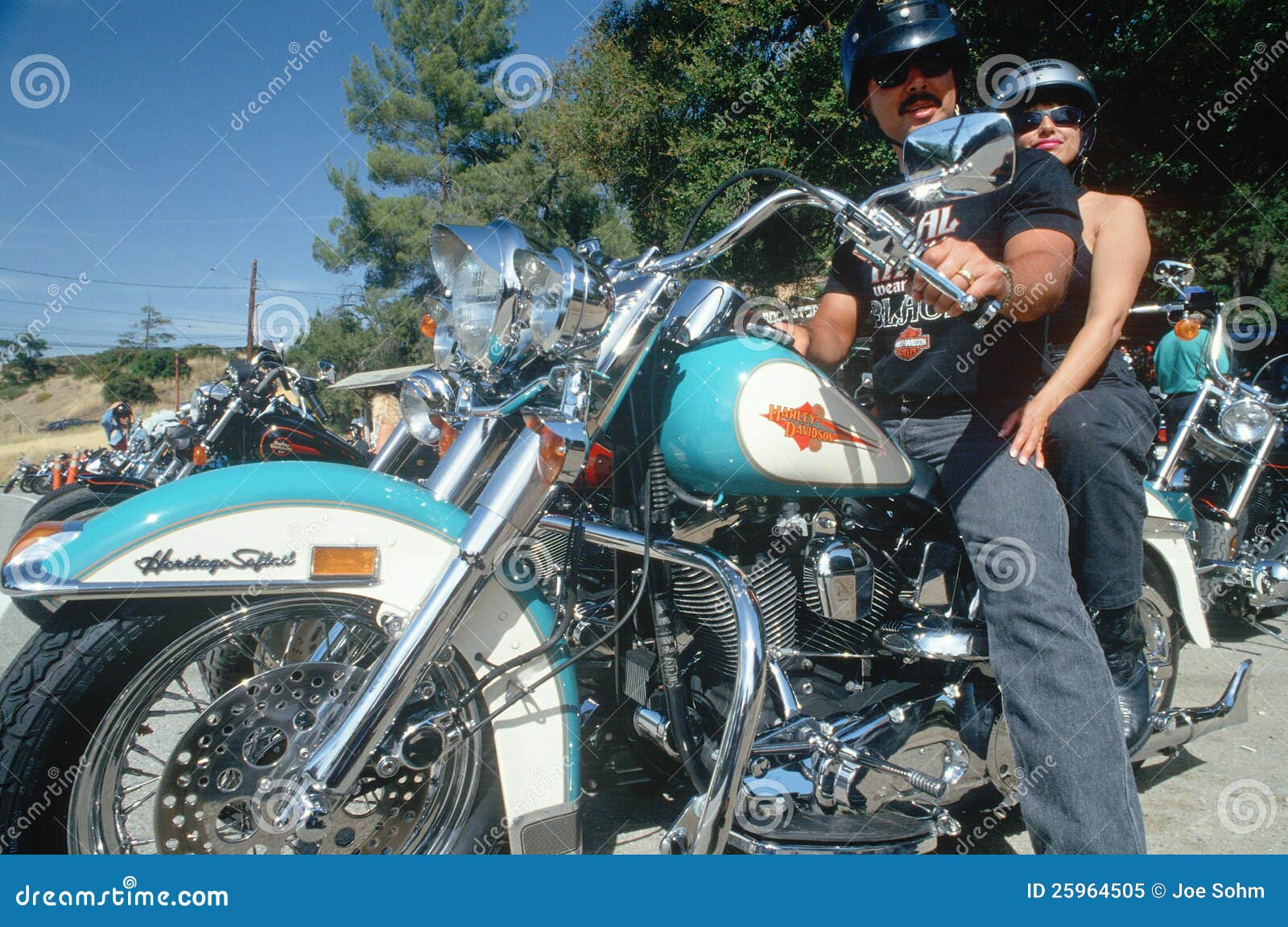 A Couple on a Harley Davidson Motorcycle, Editorial Image - Image of ...