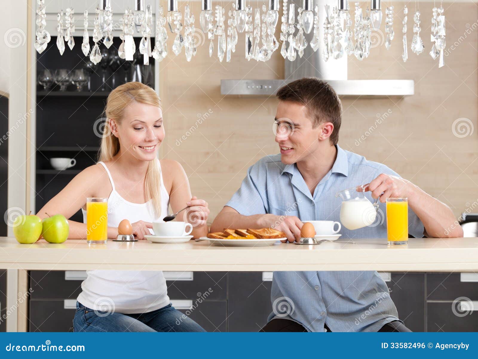 Couple Has a Snack in the Kitchen Stock Photo - Image of breakfast ...