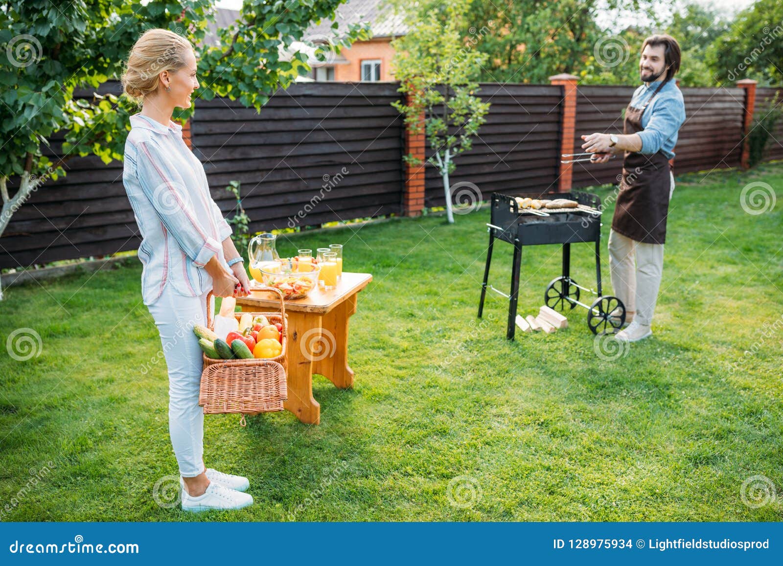 Couple Having Barbecue on Backyard Stock Photo - Image of backyard ...