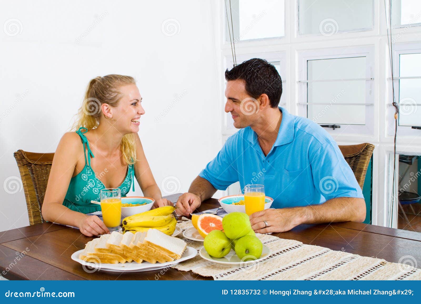 Couple having breakfast stock photo. Image of happy, family - 12835732