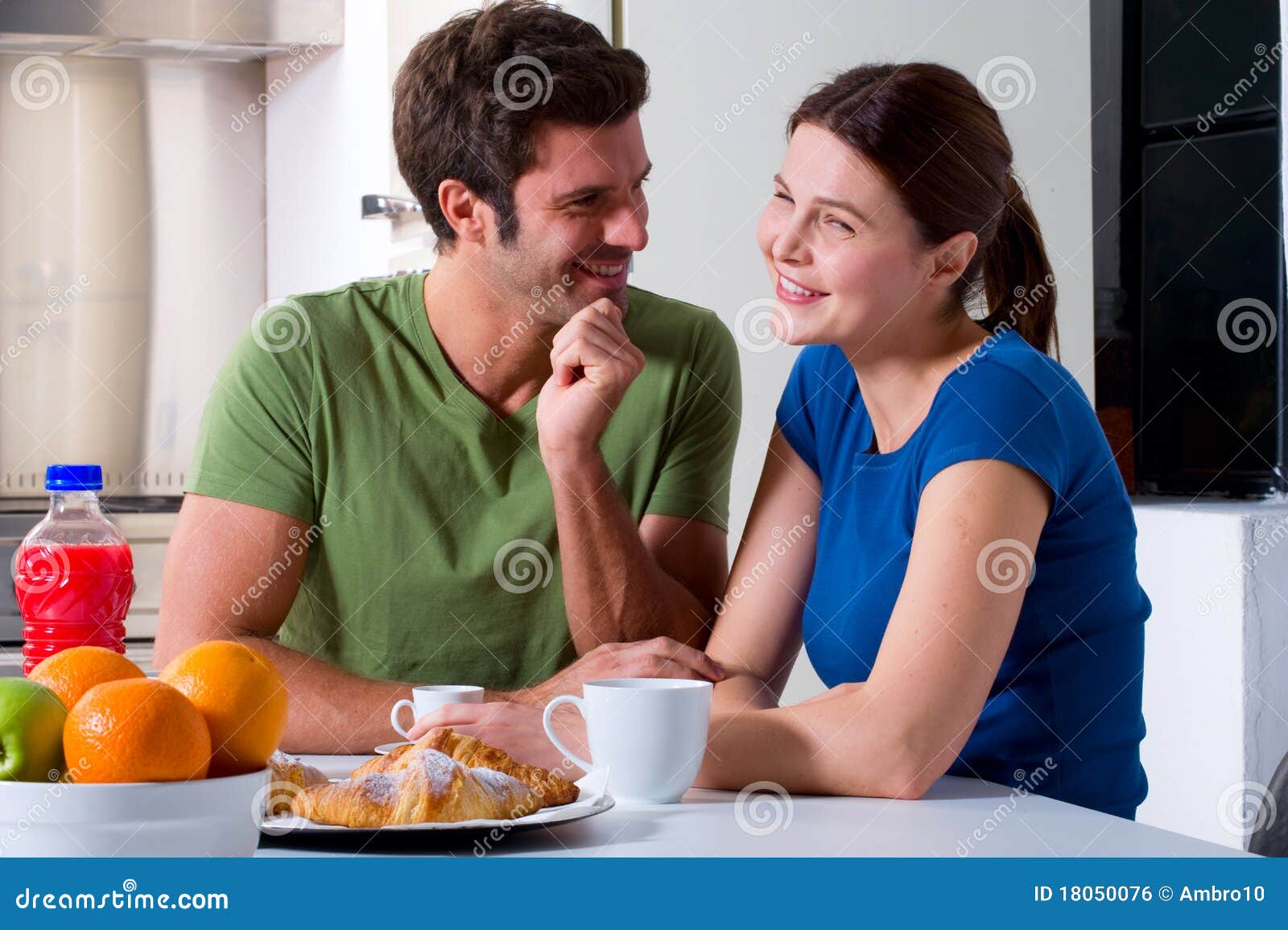 Couple having breakfast stock photo. Image of indoor - 18050076