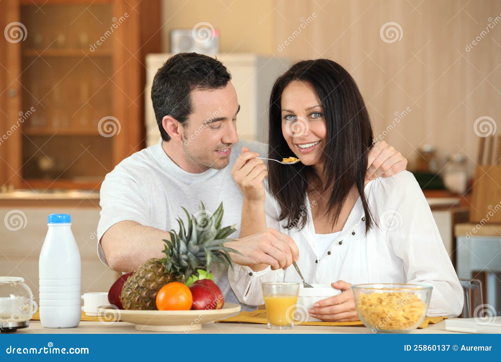 Couple having breakfast stock image. Image of expectant - 25860137