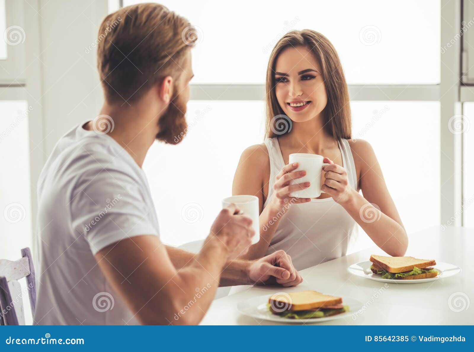Couple having a breakfast stock image. Image of caucasian - 85642385
