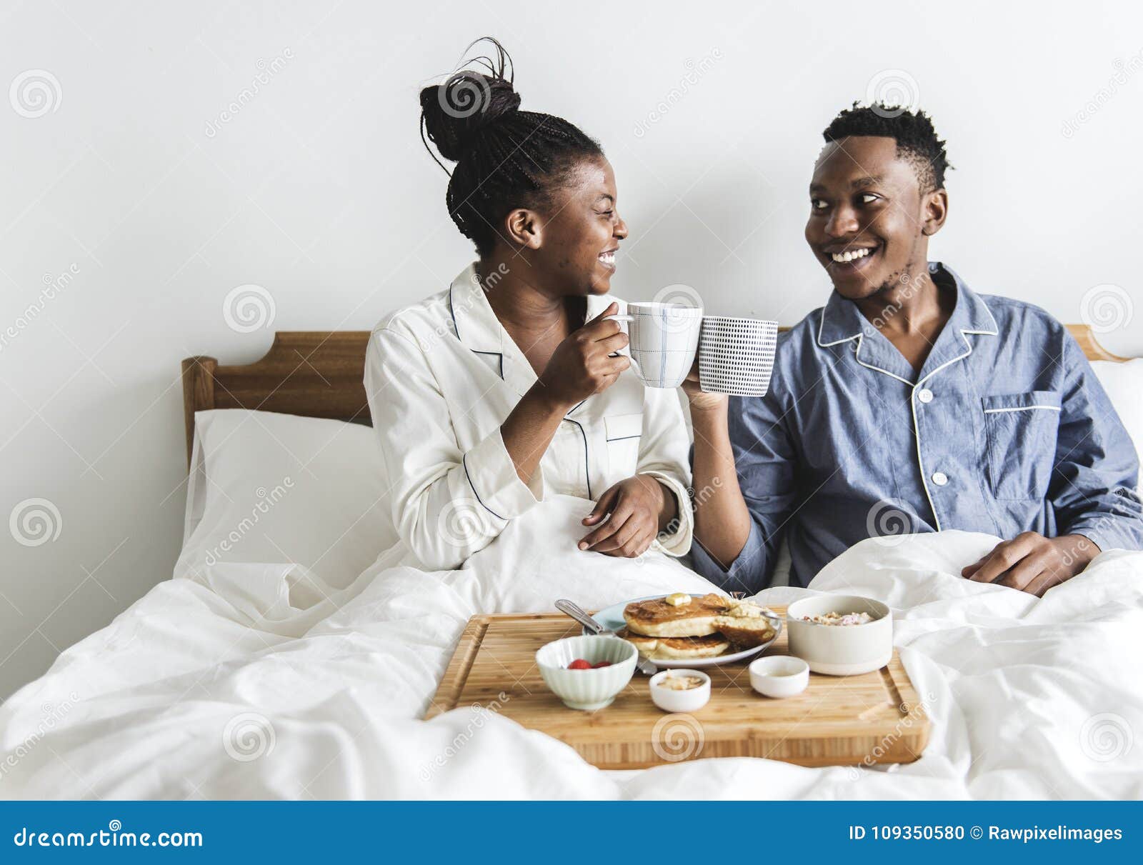 A Couple Having Breakfast in Bed Stock Photo - Image of boyfriend ...