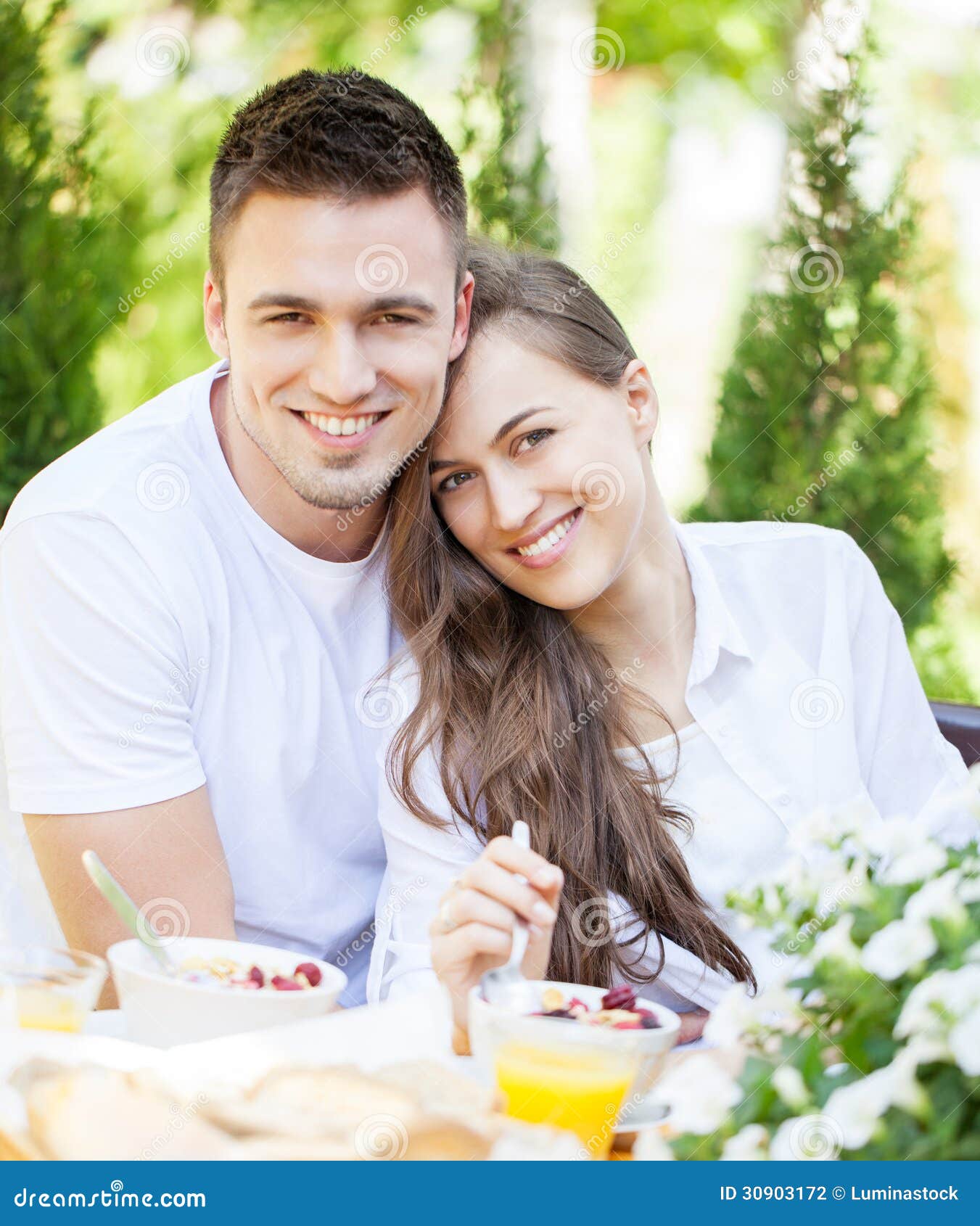 Couple Having Breakfast stock photo. Image of eyes, breakfast - 30903172
