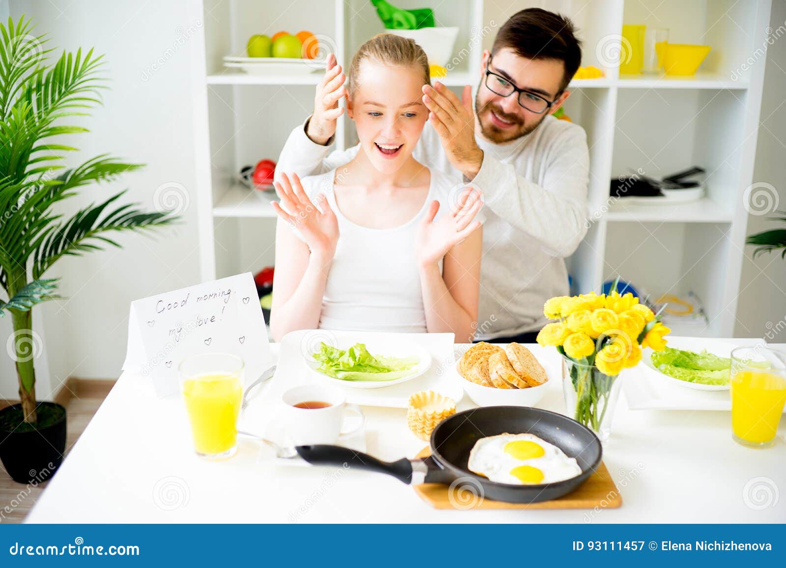 Couple having breakfast stock image. Image of home, breakfast - 93111457
