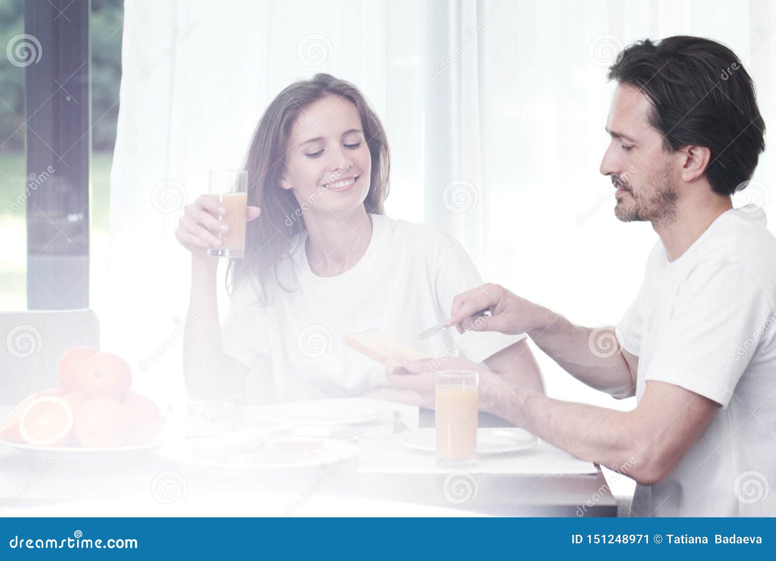 Couple having breakfast stock image. Image of juice - 151248971