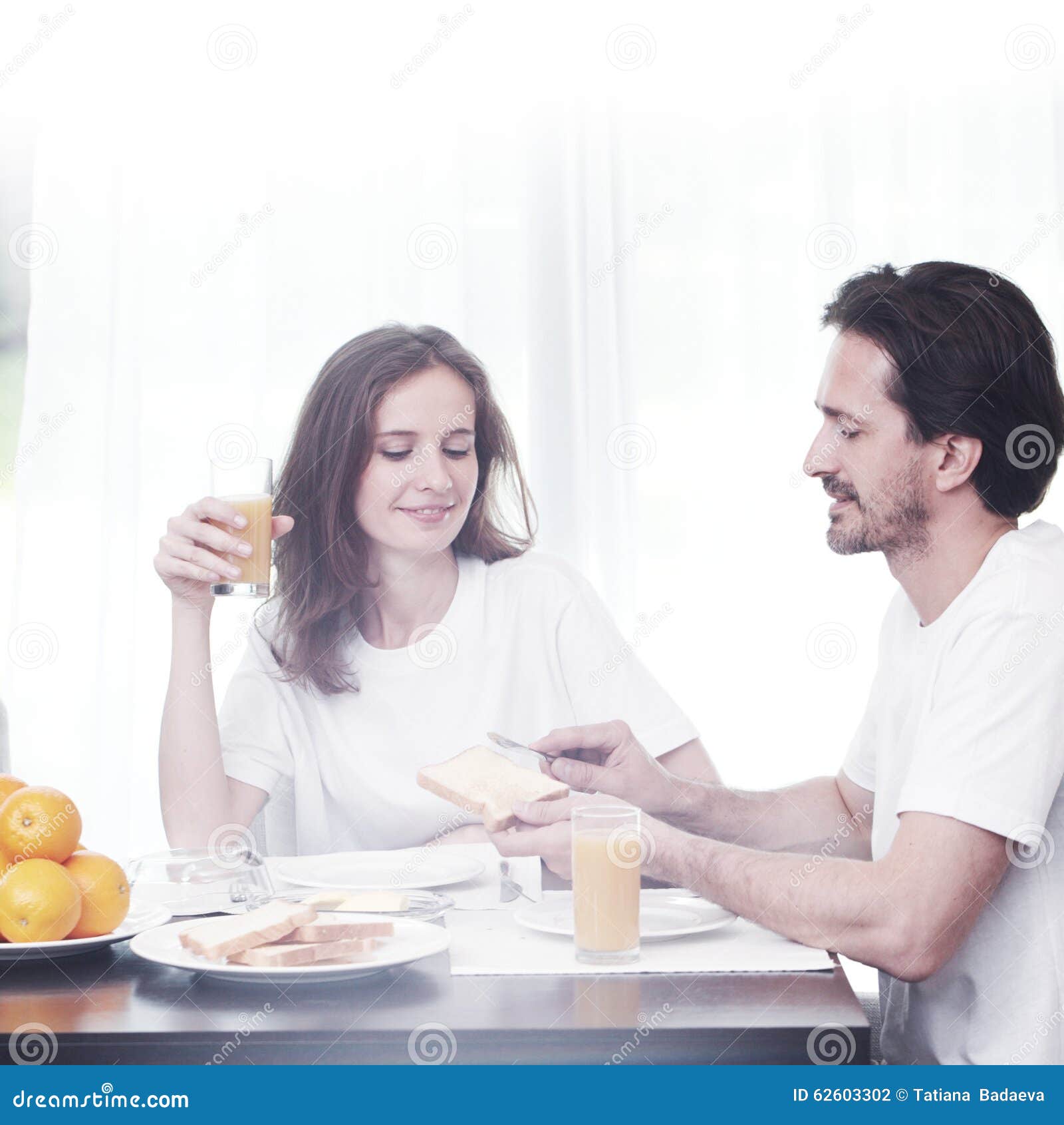 Couple having breakfast stock photo. Image of male, people - 62603302