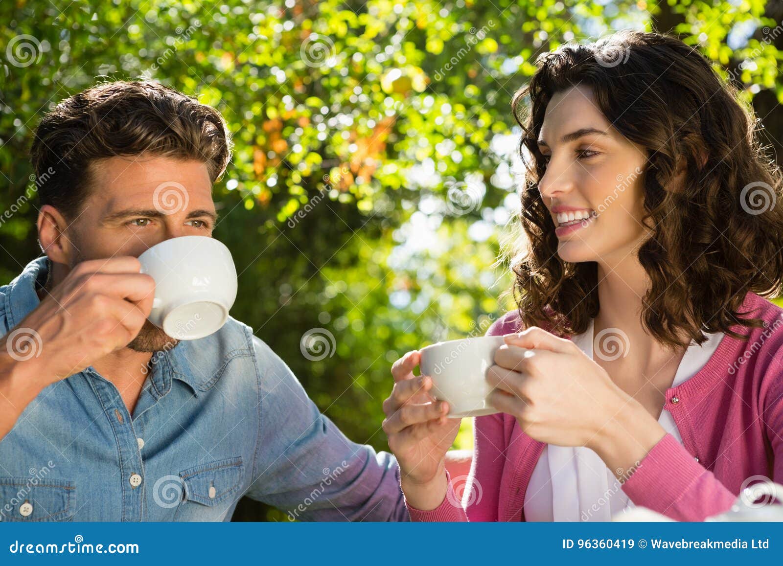 Couple Having Cup of Tea in Garden Stock Image - Image of lifestyle ...