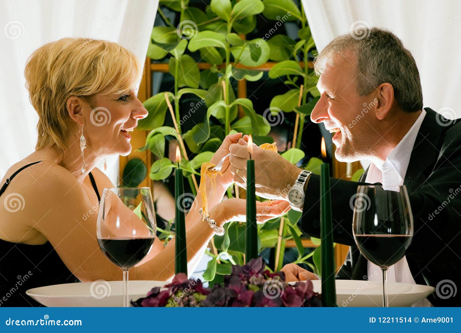 Couple Having Dinner in Restaurant Stock Photo - Image of relationship ...